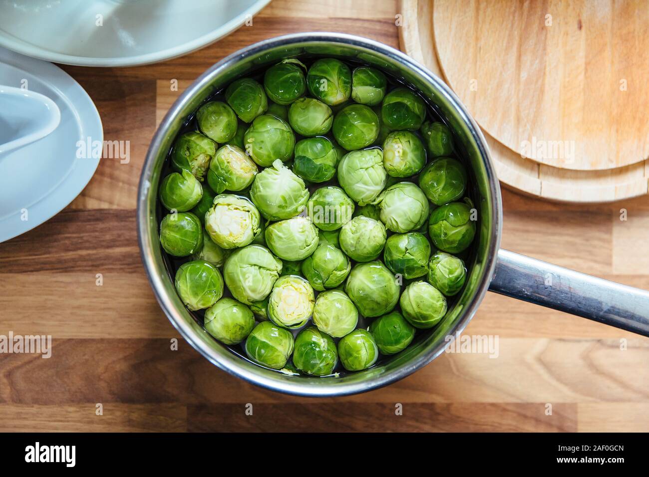 A pan of prepared sprouts in a kitchen Stock Photo - Alamy