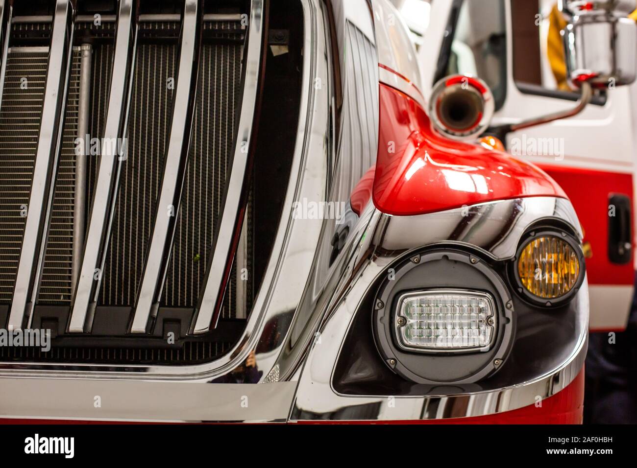 Front of fire engine parked in a station Stock Photo - Alamy