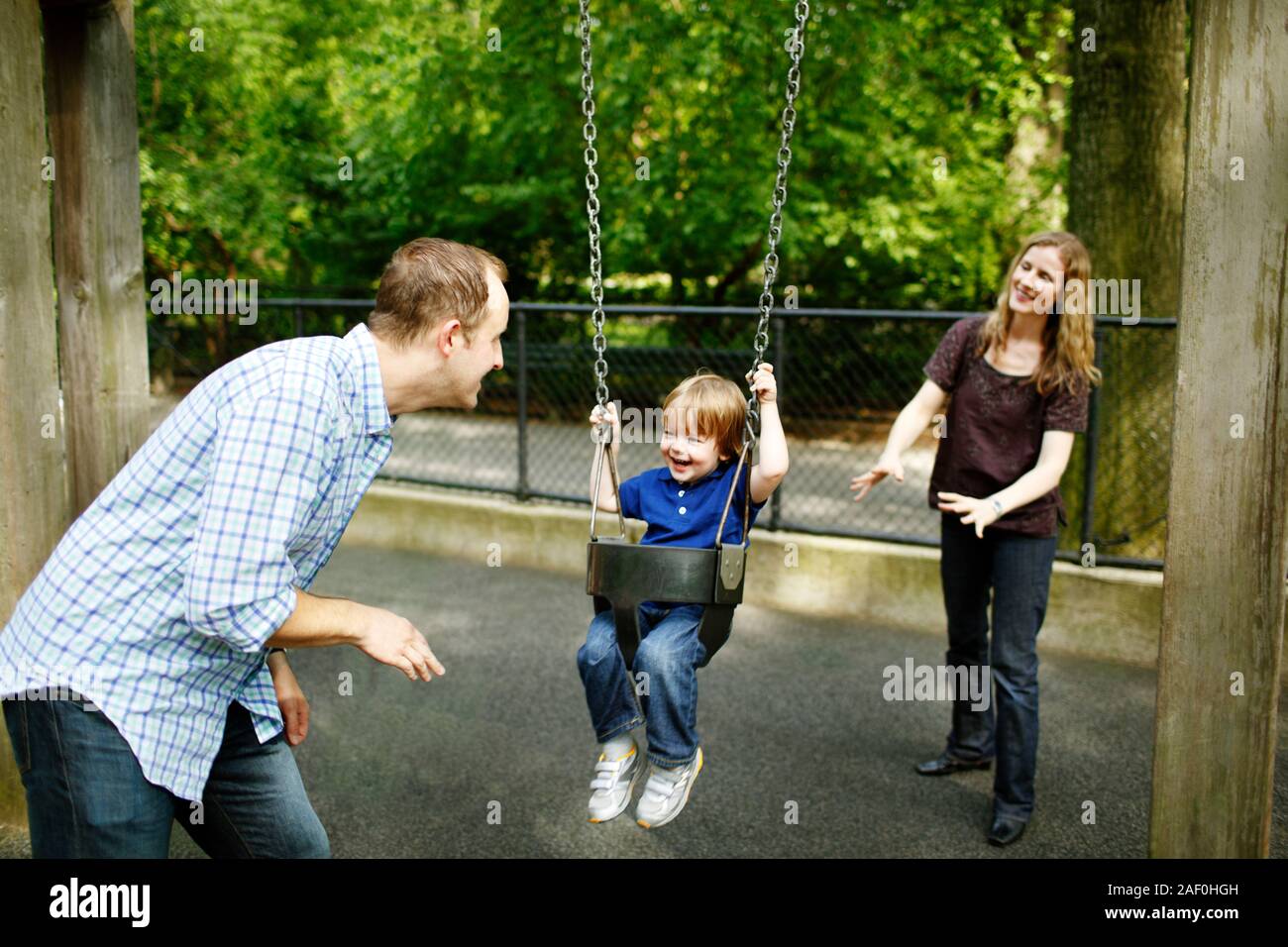 Child swing push hi-res stock photography and images - Alamy