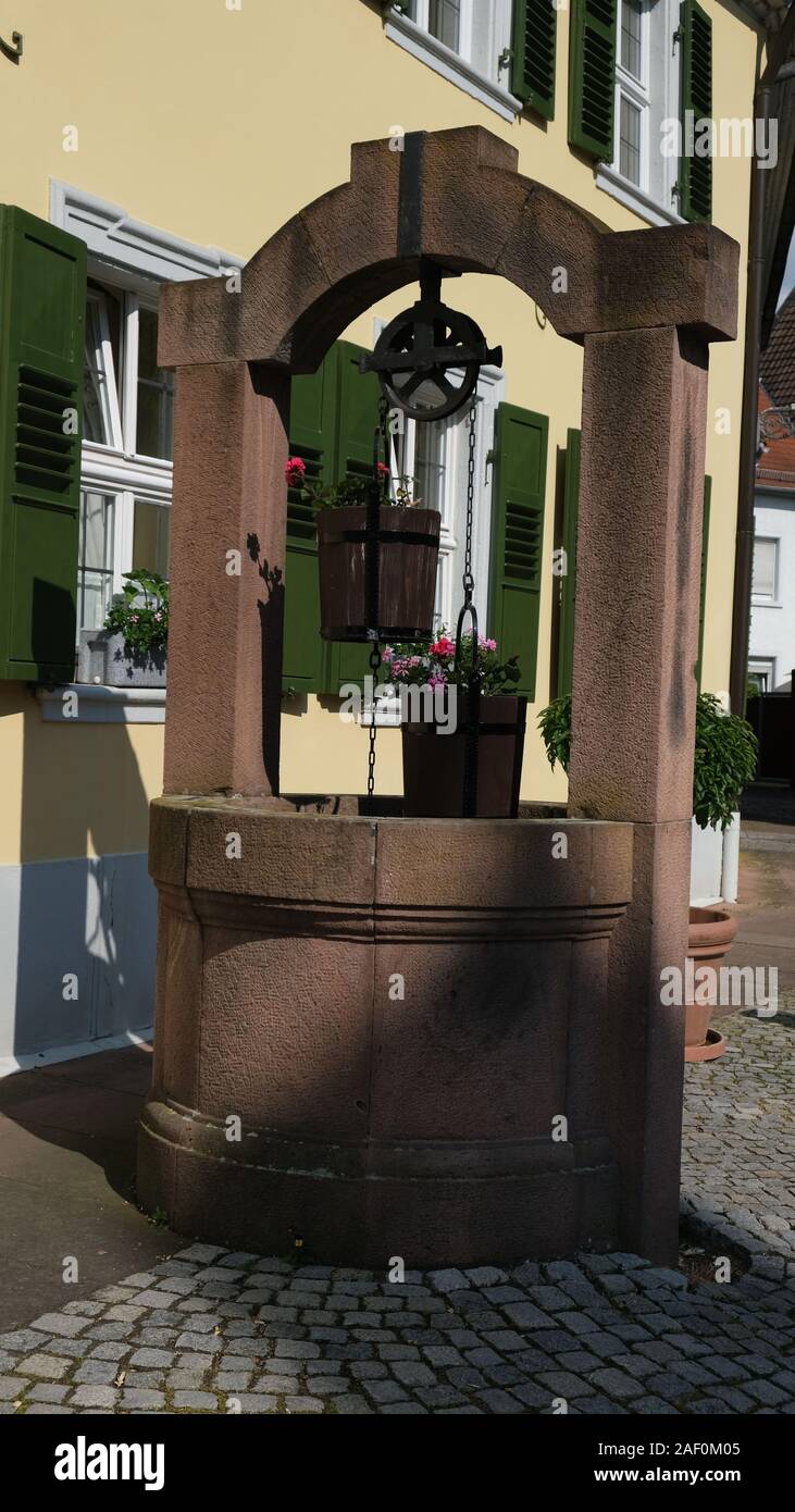 Well with Pulley Stock Photo - Alamy