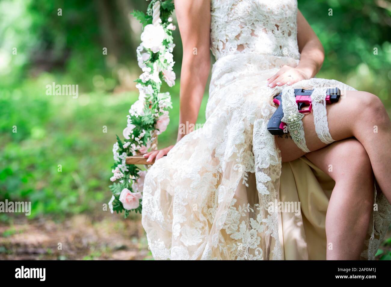 A bridal portrait with her gun Stock Photo - Alamy