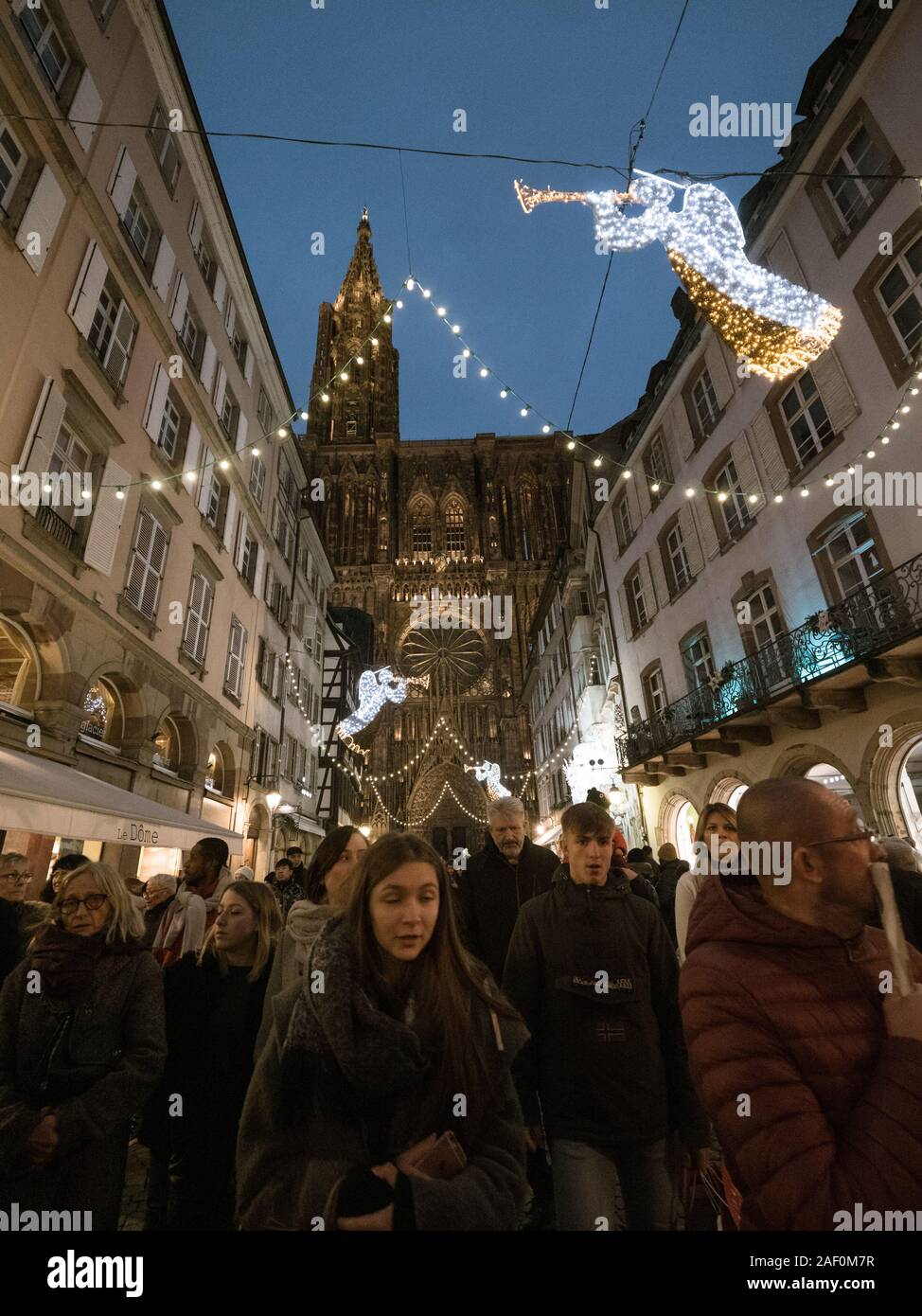 Strasbourg, France - Dec 24, 2018: Large group of pedestrians locals ...