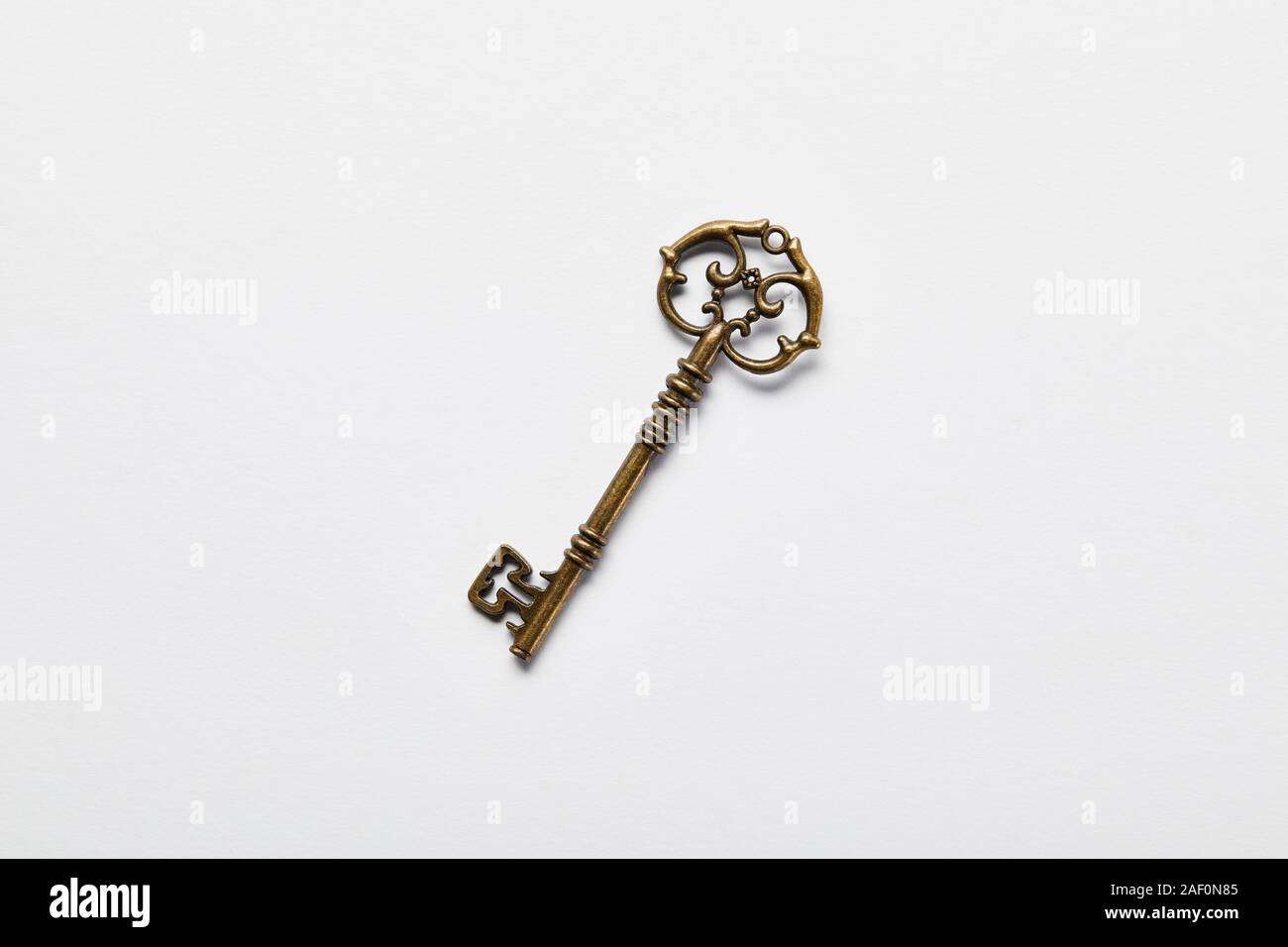top view of vintage key on white background Stock Photo - Alamy