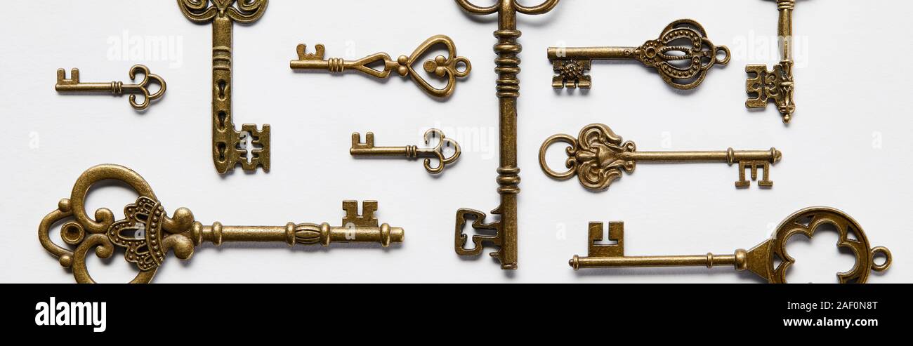 top view of vintage keys on white background, panoramic shot Stock ...