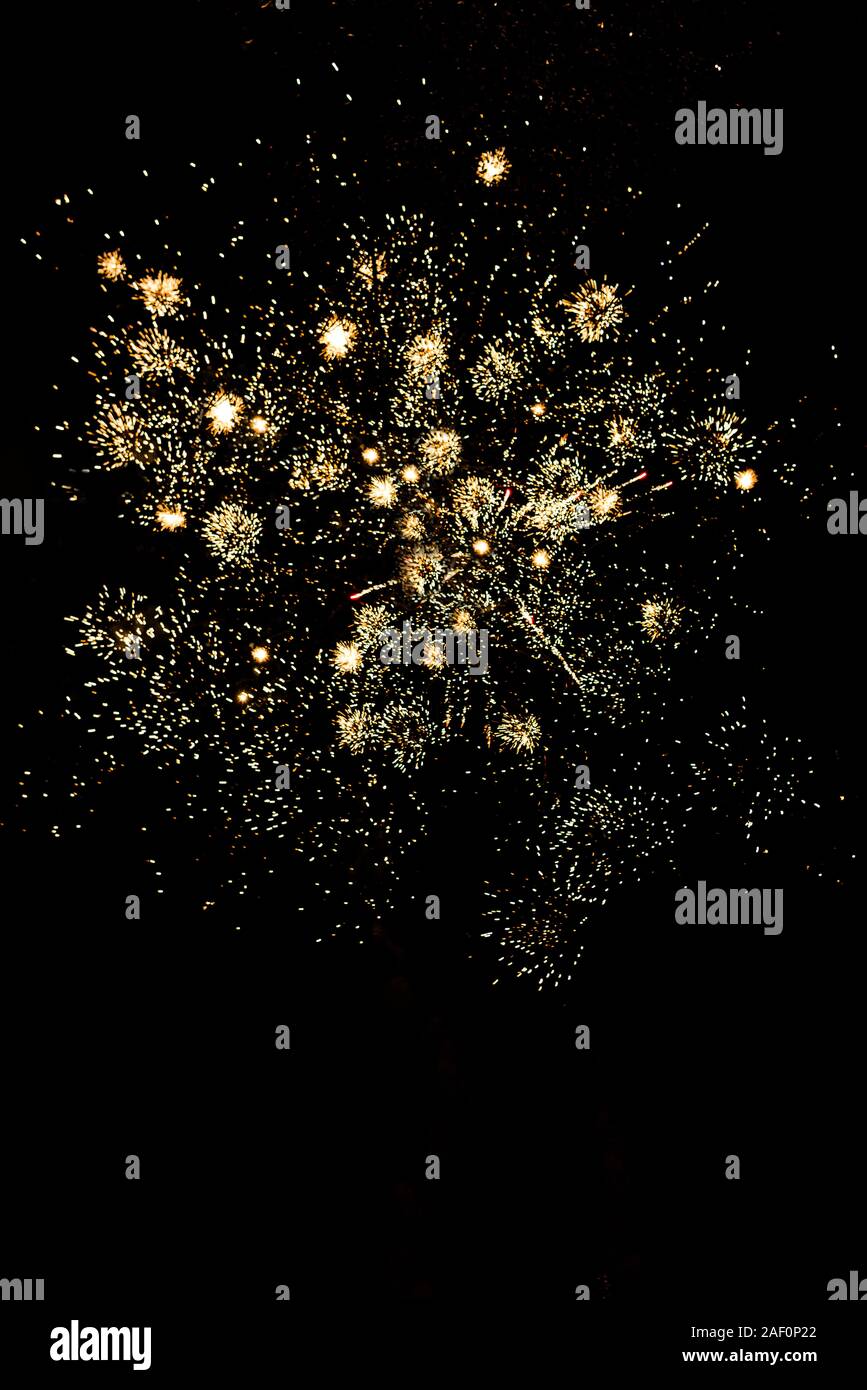 many golden fireworks in dark night sky, isolated on black Stock Photo ...