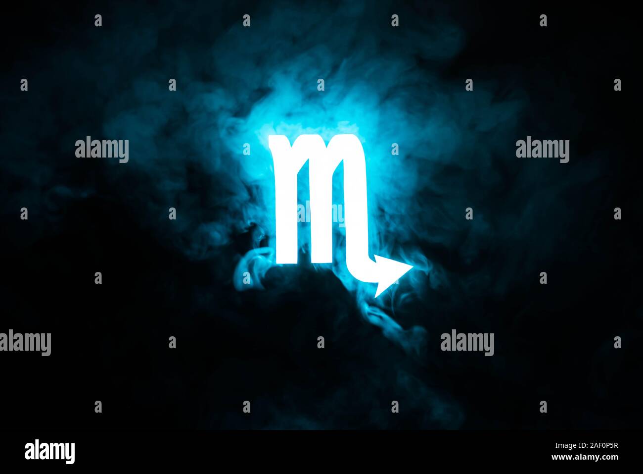 blue illuminated Scorpio zodiac sign with smoke on background Stock ...