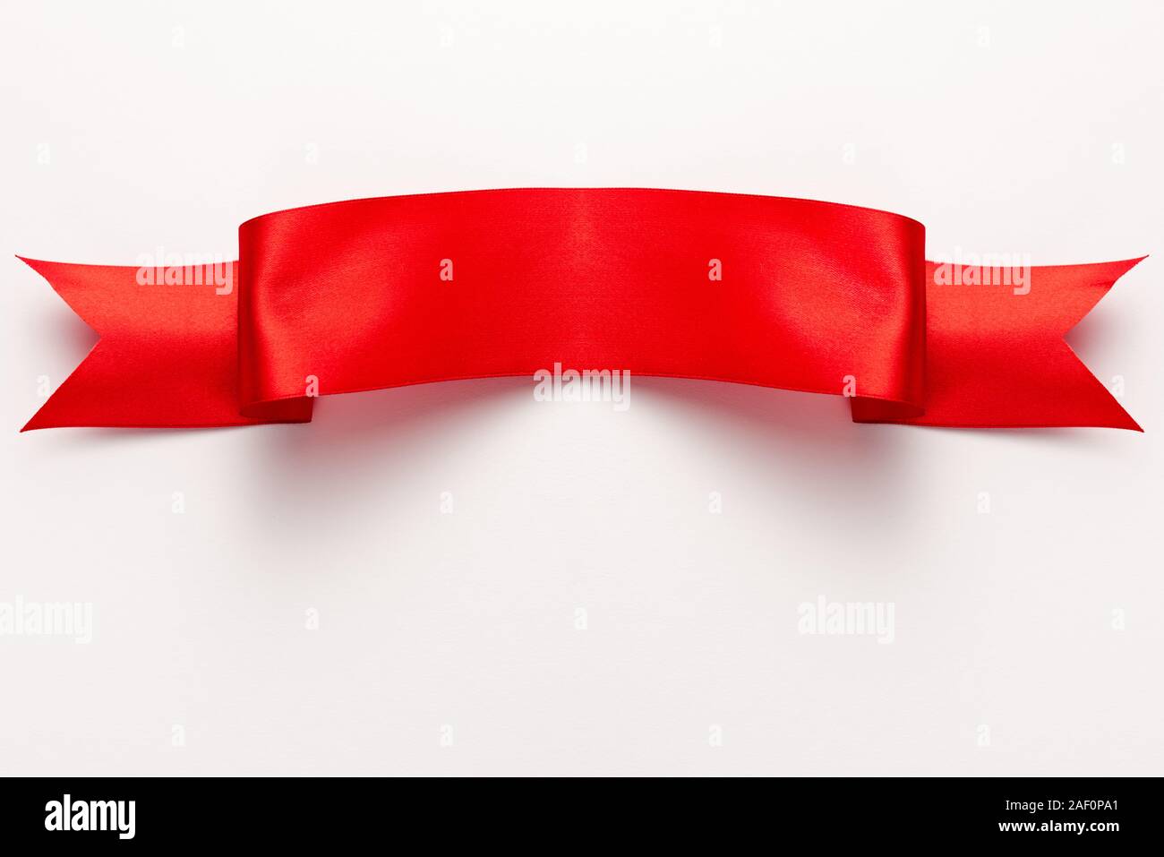 top view of satin and red ribbon on white Stock Photo - Alamy