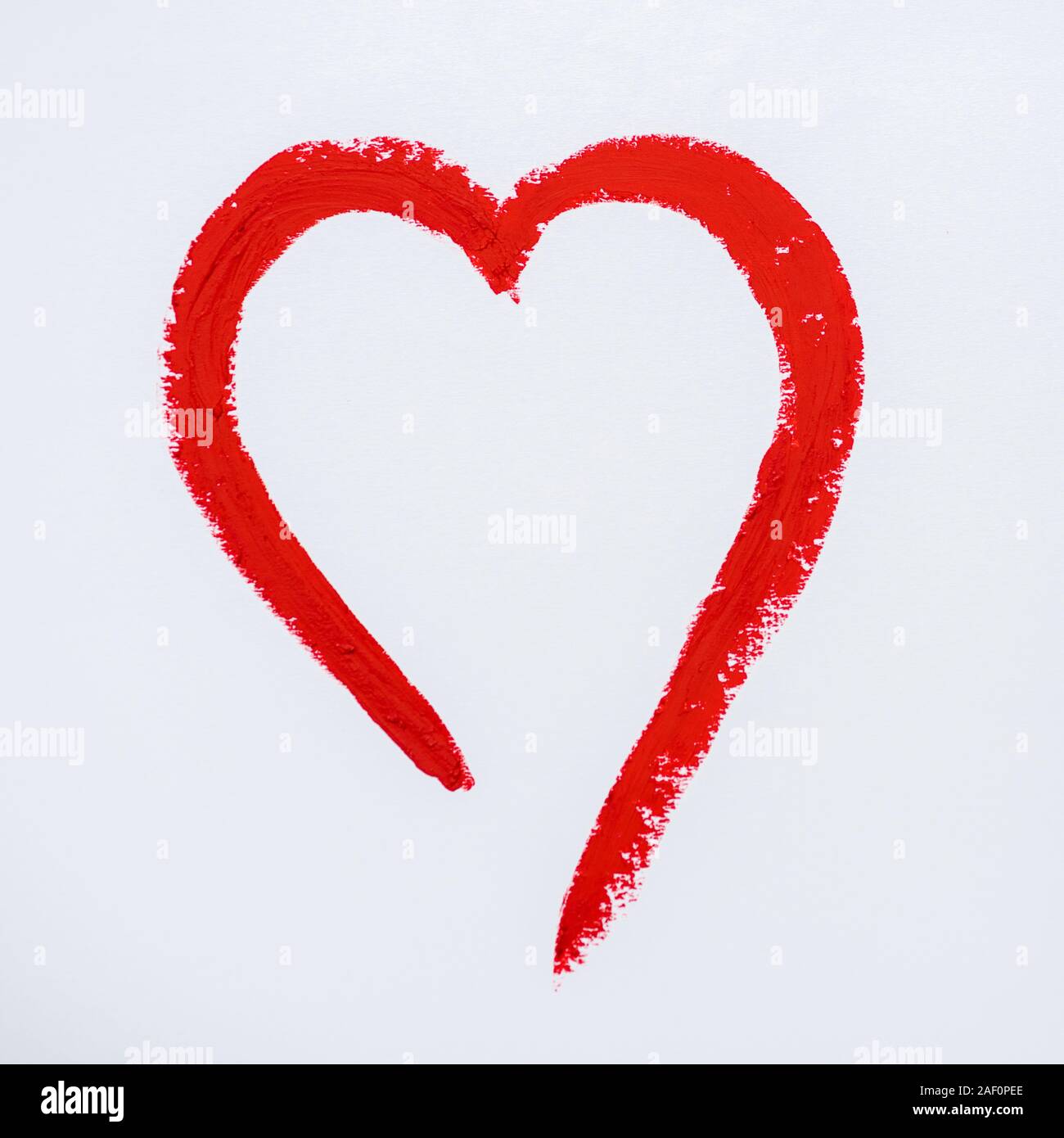 red drawn heart isolated on white Stock Photo - Alamy