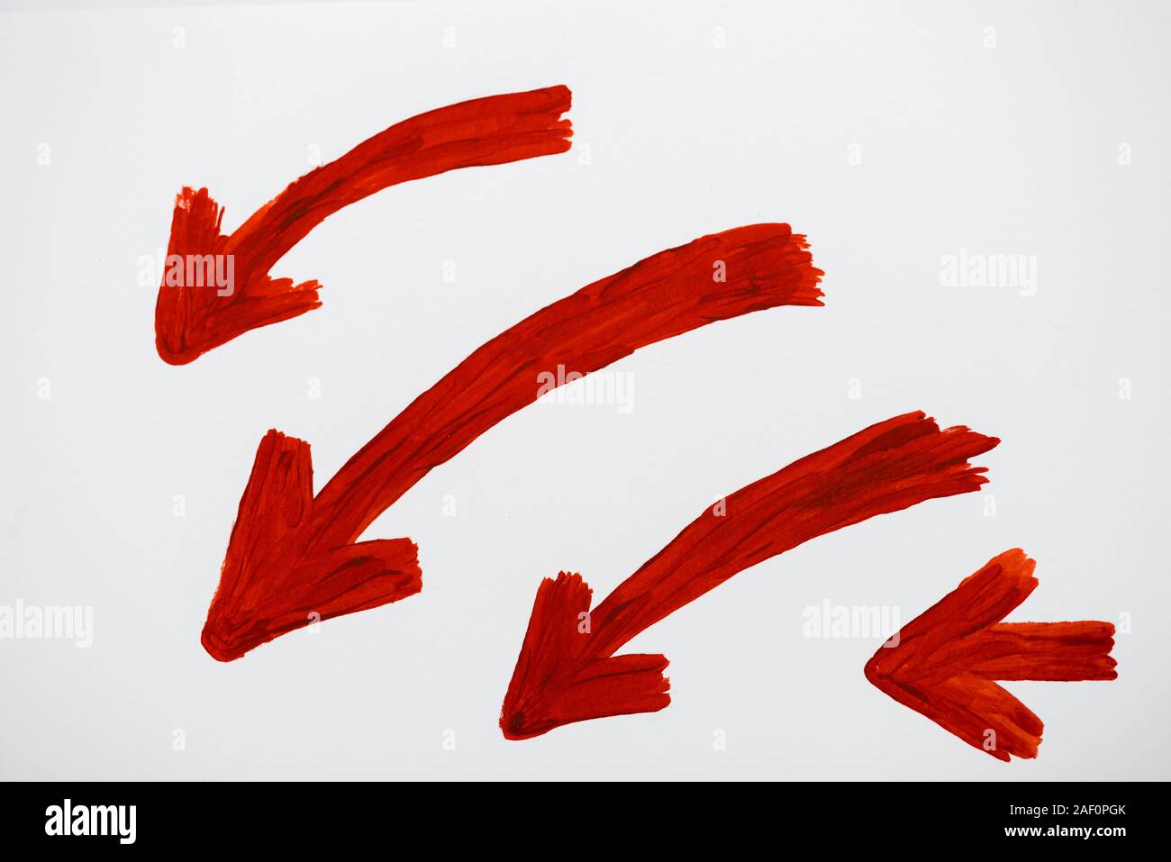 red and drawn directional arrows on white Stock Photo - Alamy