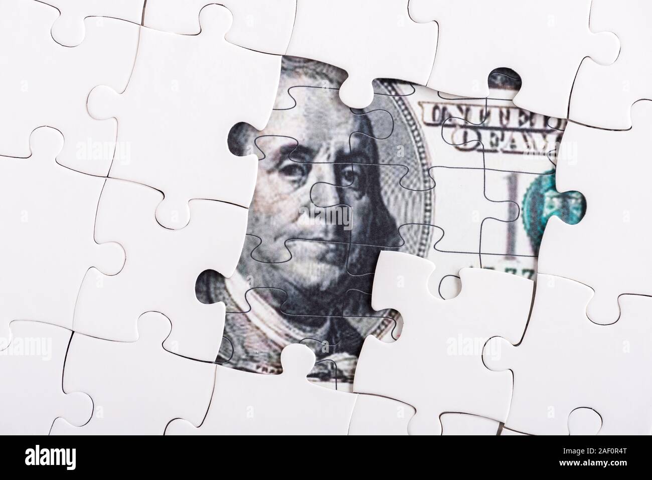 close up of puzzle pieces of dollar banknote Stock Photo - Alamy