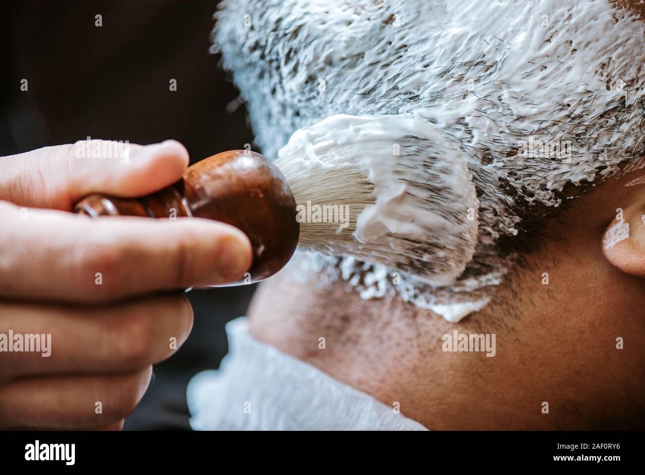 Close up barber applying hi-res stock photography and images - Alamy