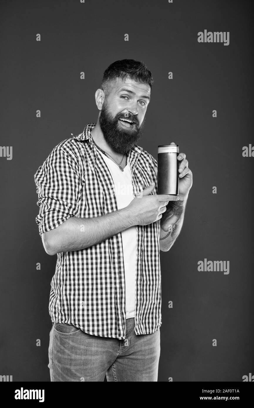 Hygiene habits for men. Hipster holding gel or shampoo bottle for ...
