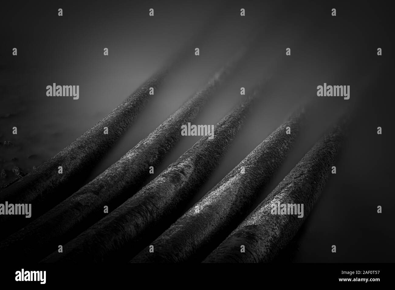 Abstract Image of Pipes in Sea Water Stock Photo - Alamy