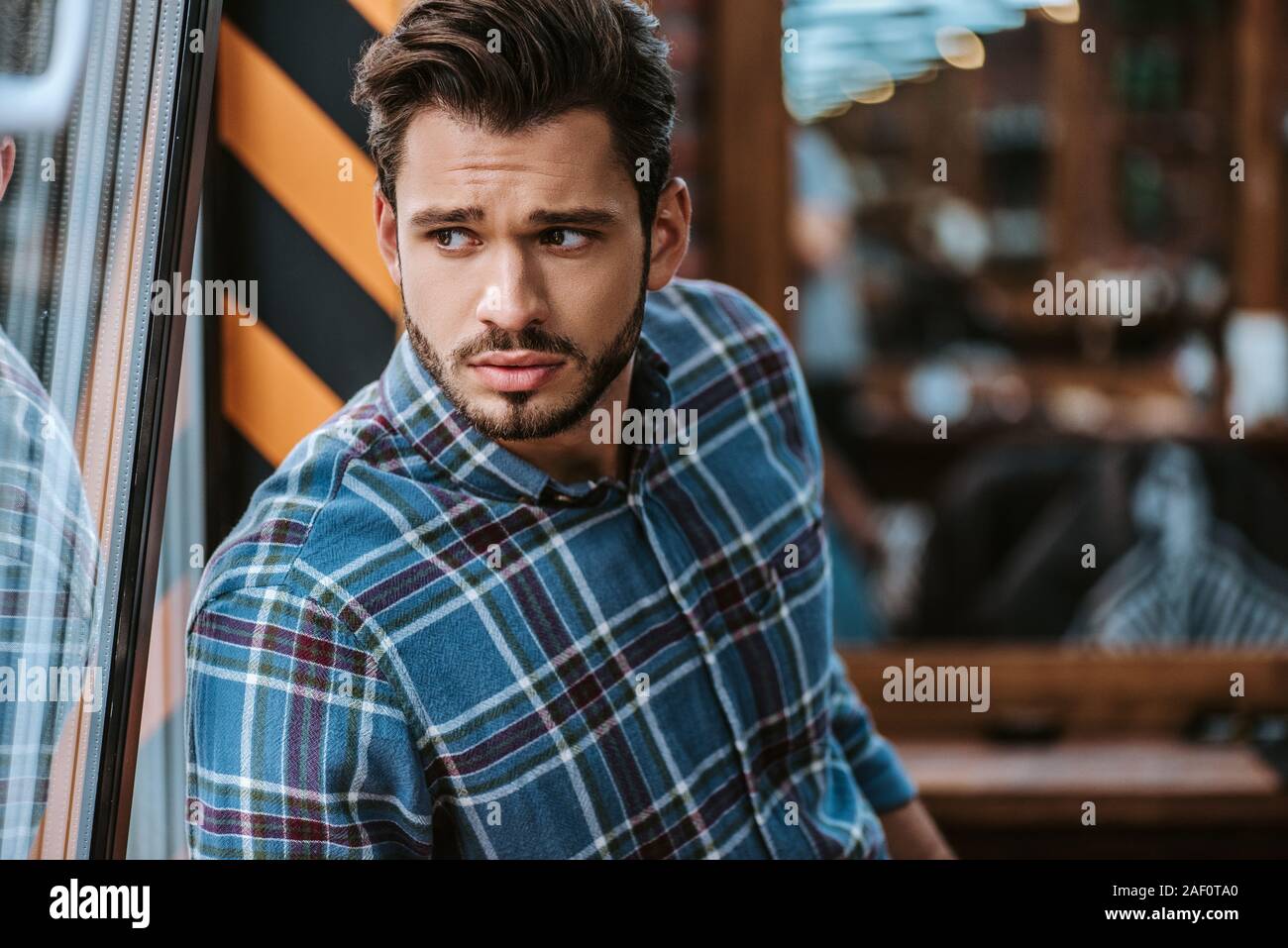 Confused young bearded hipster man hi-res stock photography and images ...