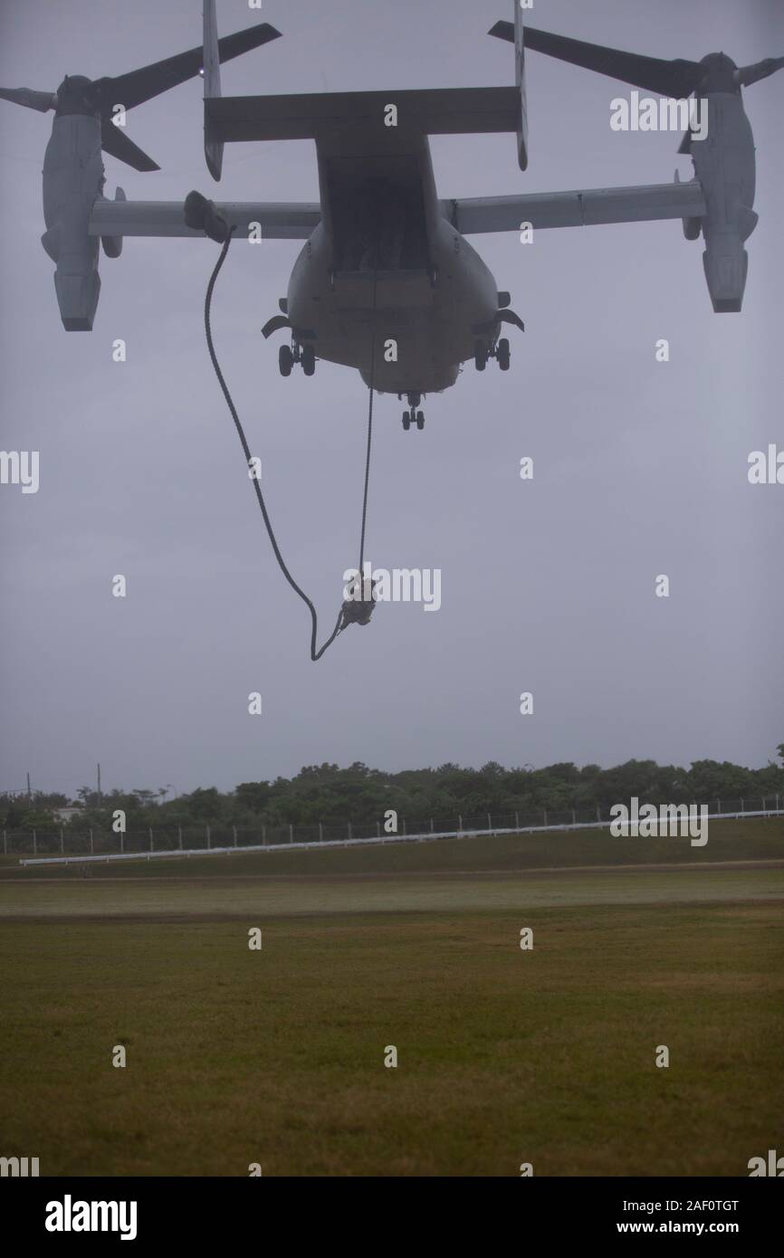 U.S. Marines with 3rd Reconnaissance Battalion conduct fast roping for ...