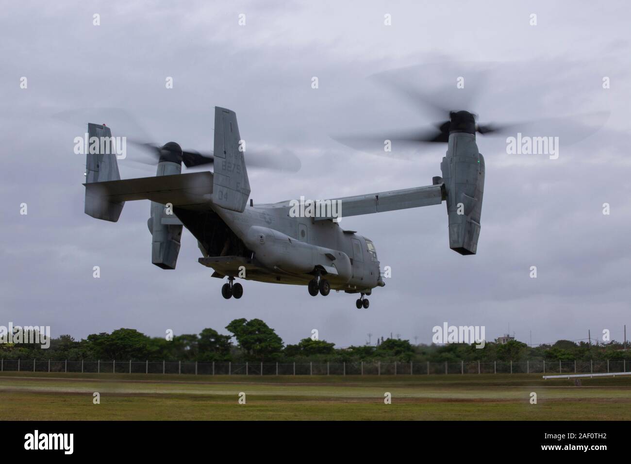 U.S. Marine Corps MV-22 Osprey takes off from training area for ...