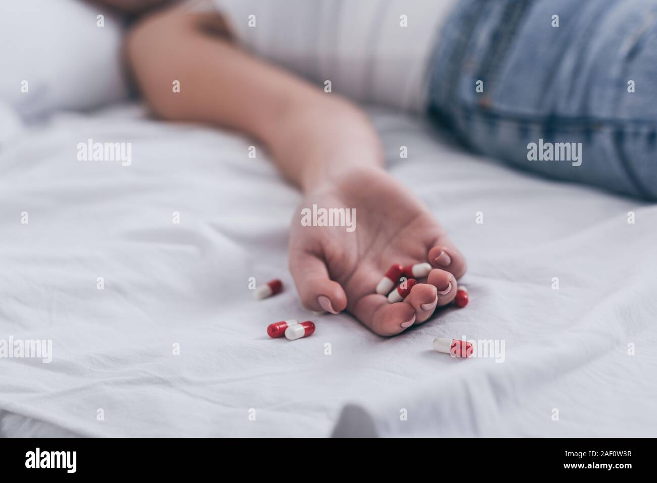 Woman lying dead on bed hi-res stock photography and images - Alamy