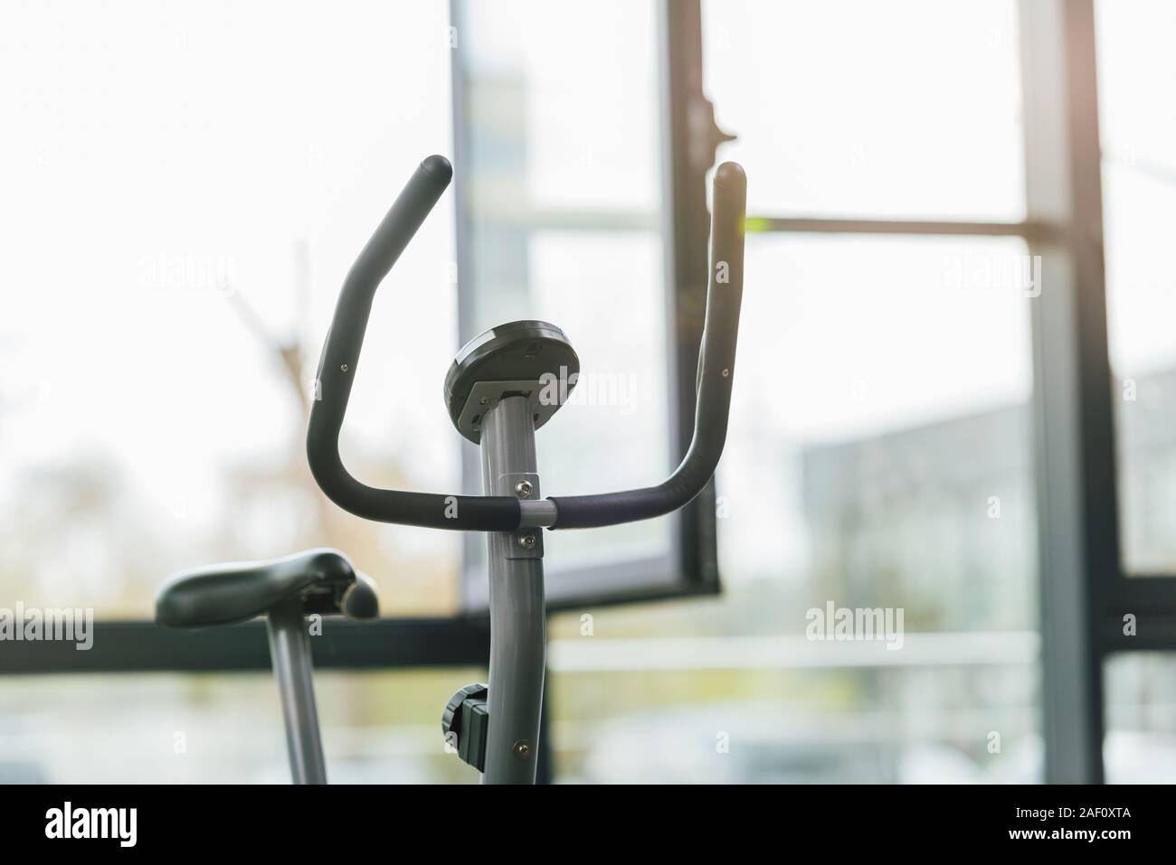 selective focus of modern elliptical machine at sports center Stock ...