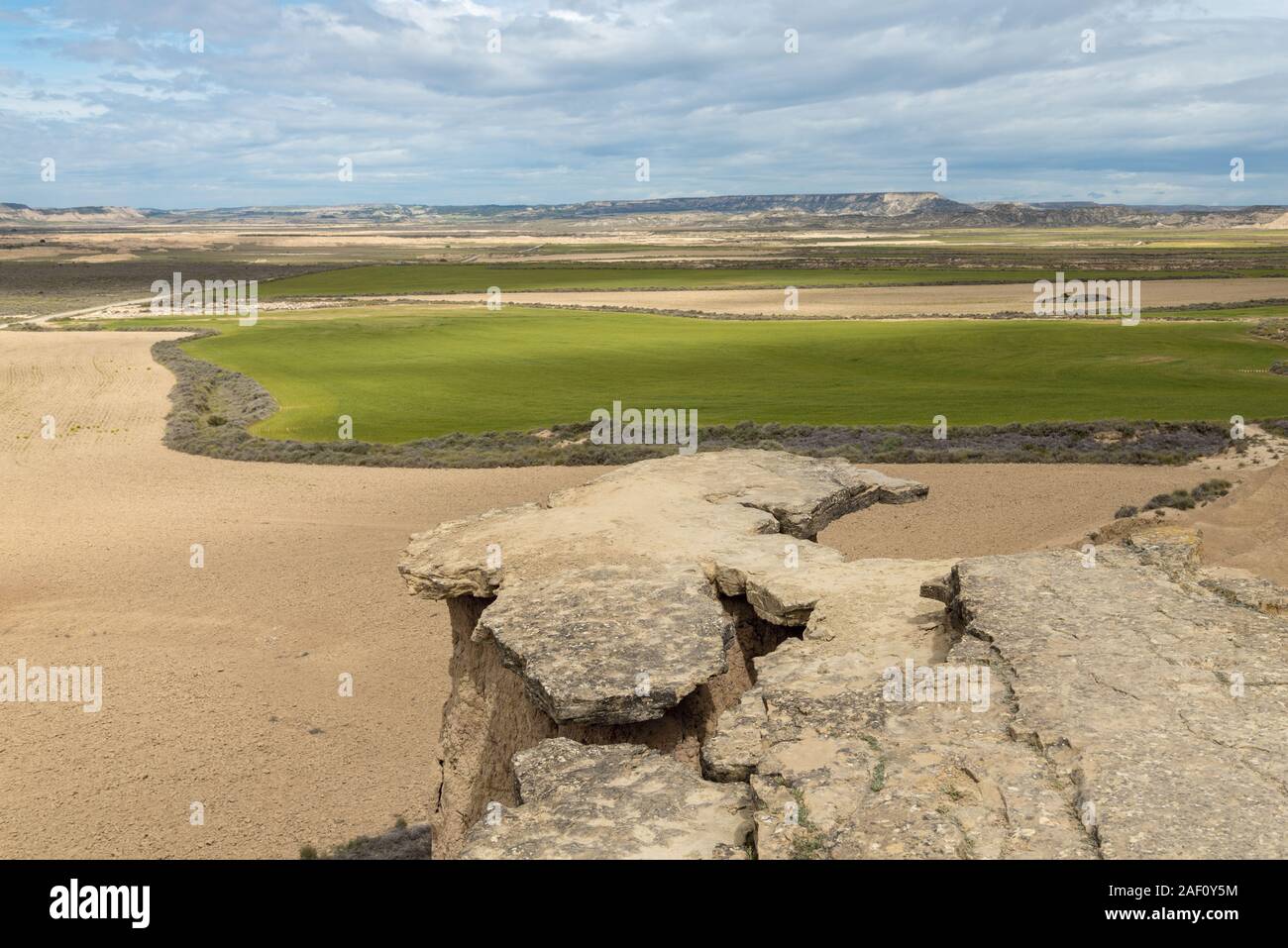 Flat-topped mountain above the plain with agricultural fields near the ...