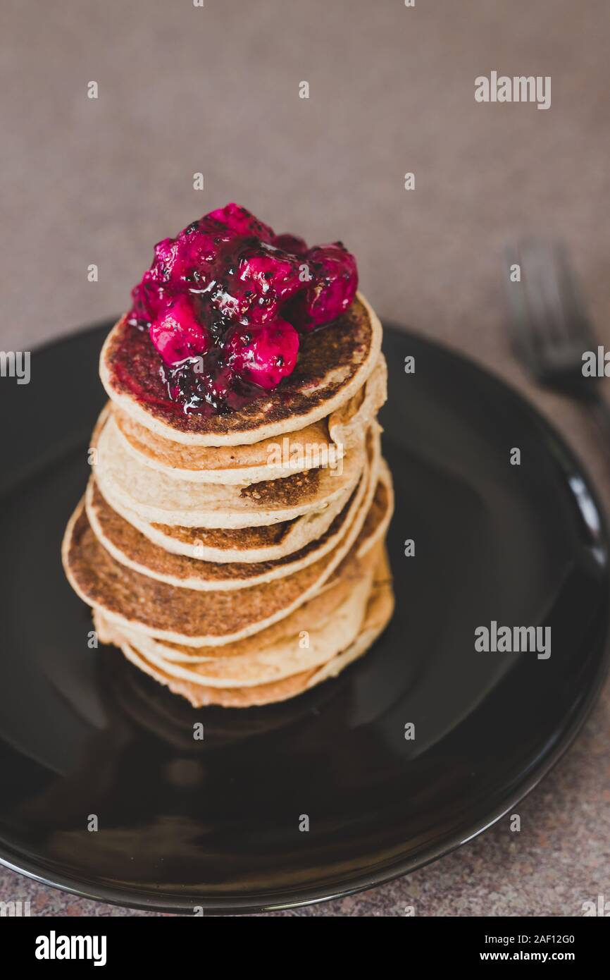 healthy plant-based recipes concept, vegan banana pancakes stack with ...
