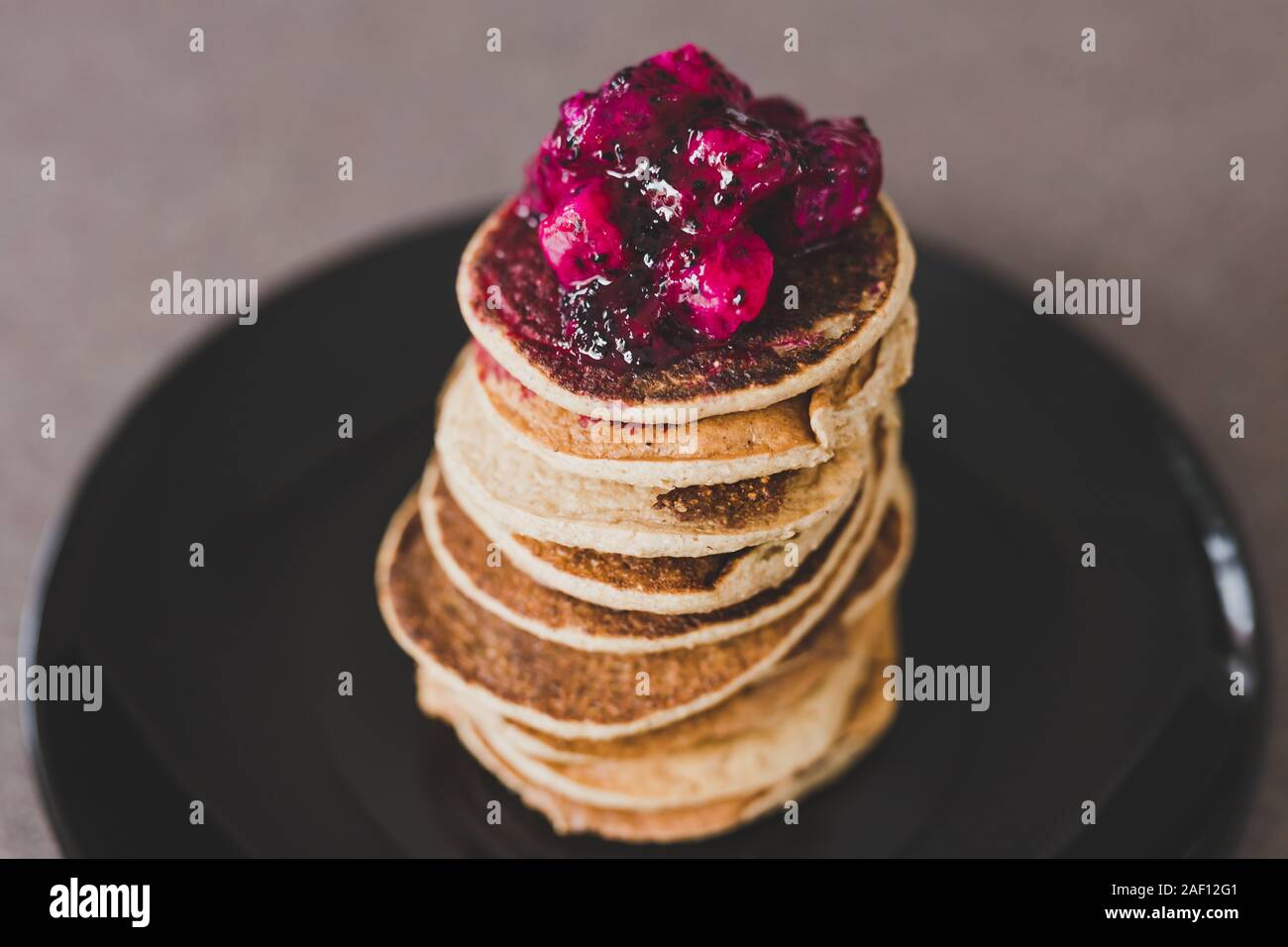 healthy plant-based recipes concept, vegan banana pancakes stack with ...