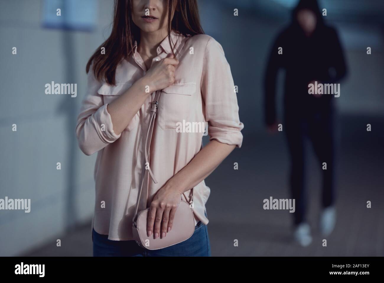 Woman running away danger hi-res stock photography and images - Alamy