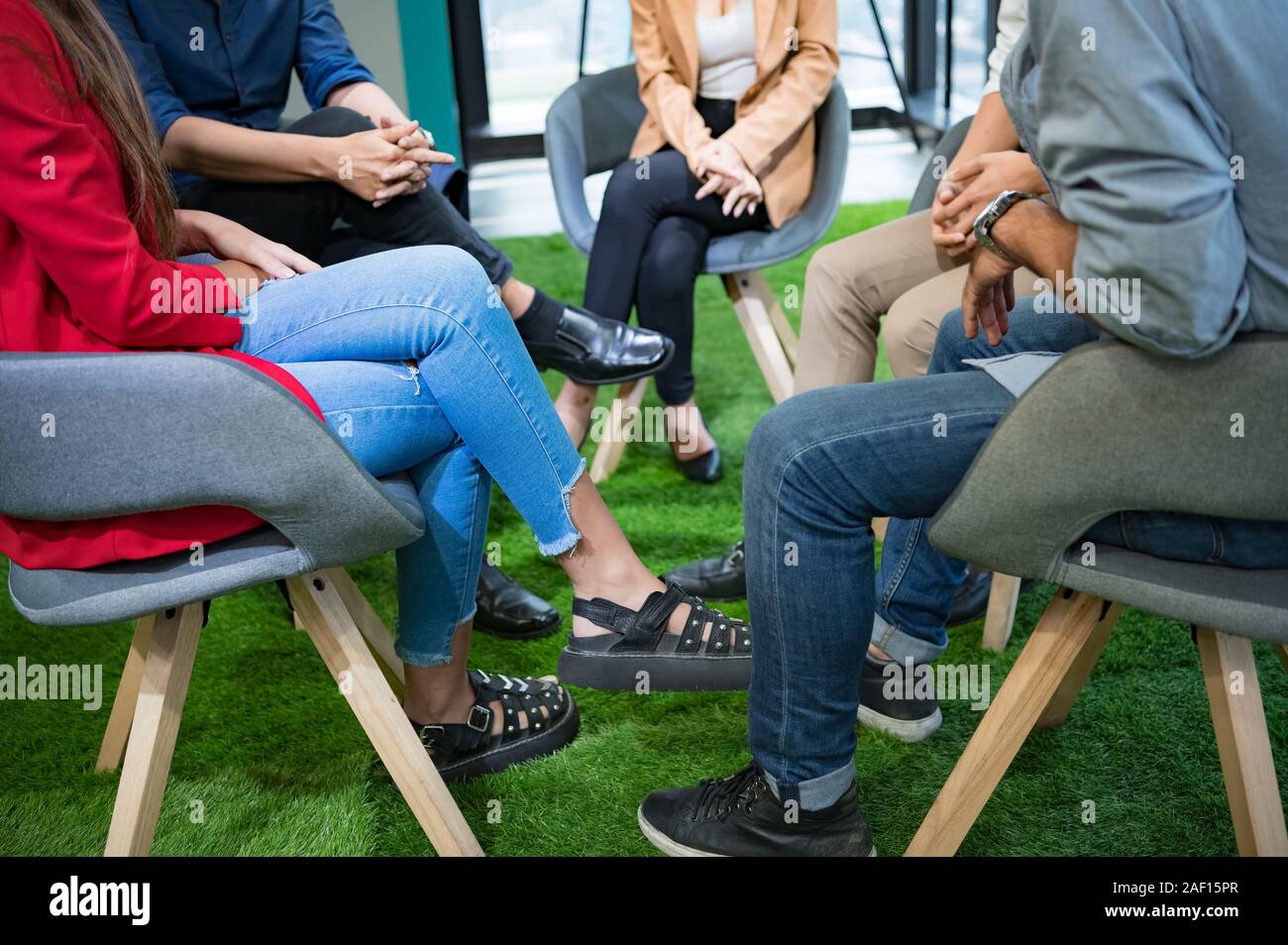 Psychotherapist inquiring about symptoms occurring within mind from ...