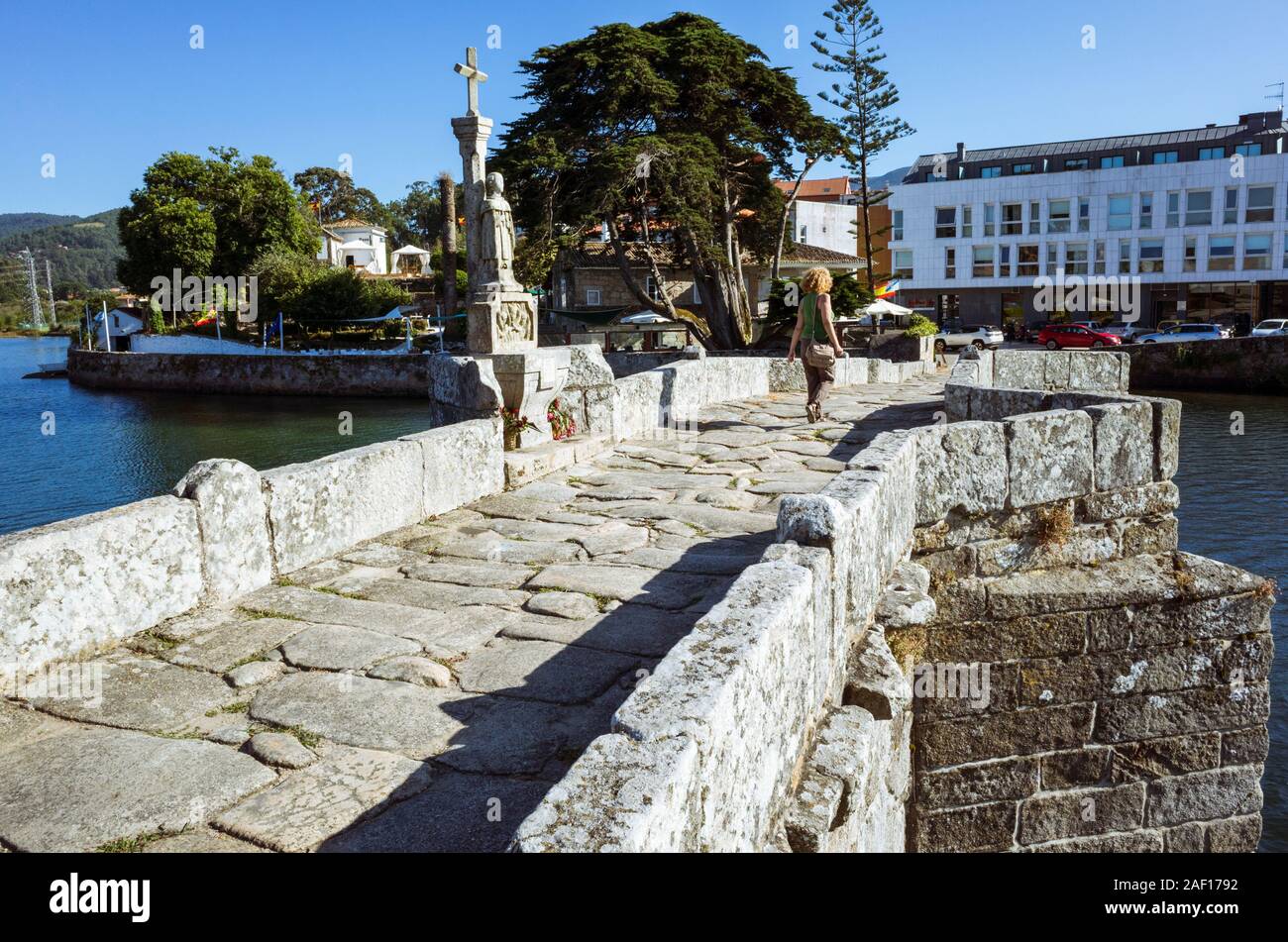 Nigran, Pontevedra province, Galicia, Spain : A woman walks past the ...