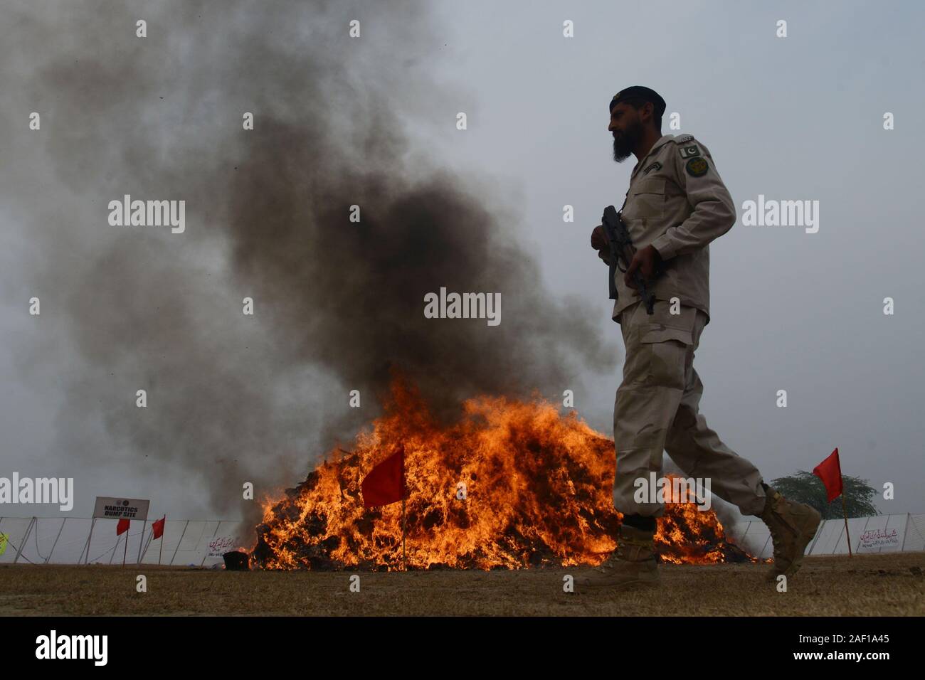 Lahore, Pakistan. 11th Dec, 2019. Pakistani member of Anti-Narcotic ...