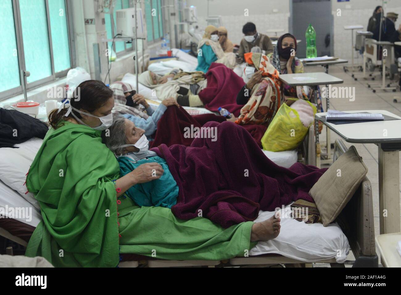 Pakistani Police officers detain angry lawyers (C in white shirt ...