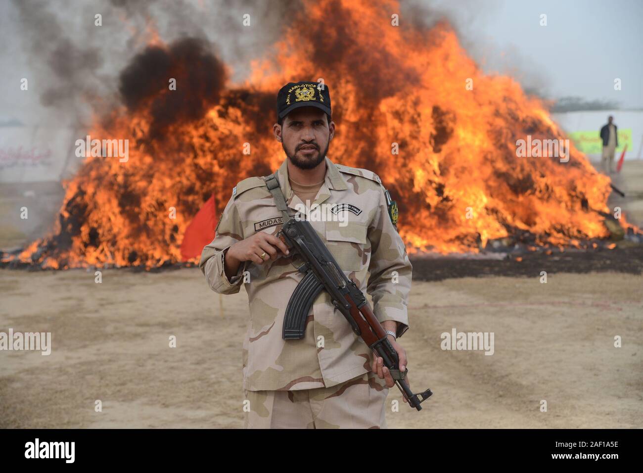 Lahore, Pakistan. 11th Dec, 2019. Pakistani member of Anti-Narcotic ...