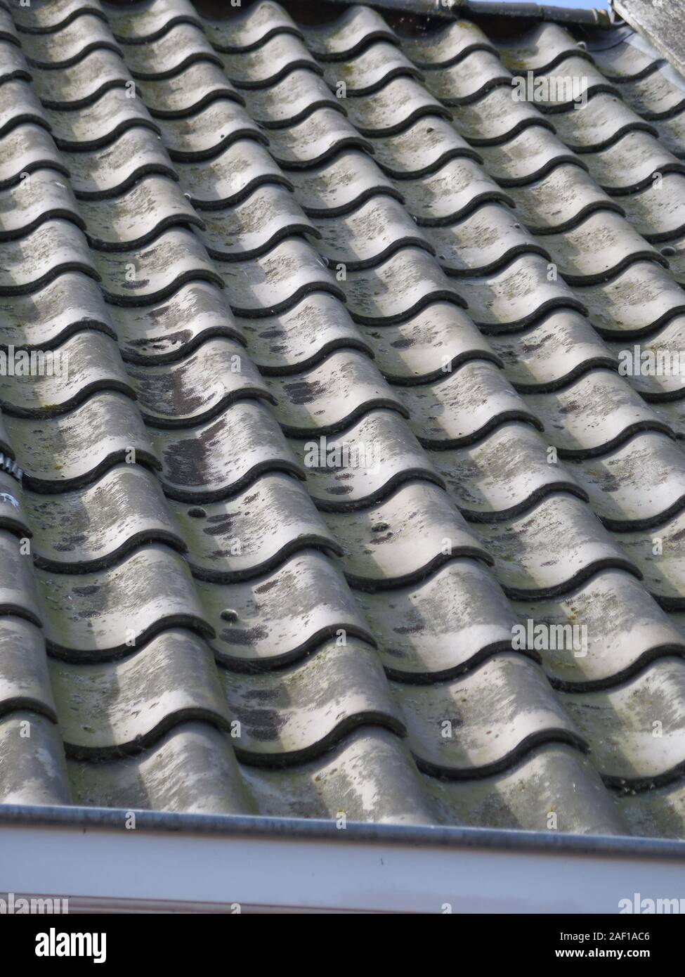 Wavy roof tiles hi-res stock photography and images - Alamy