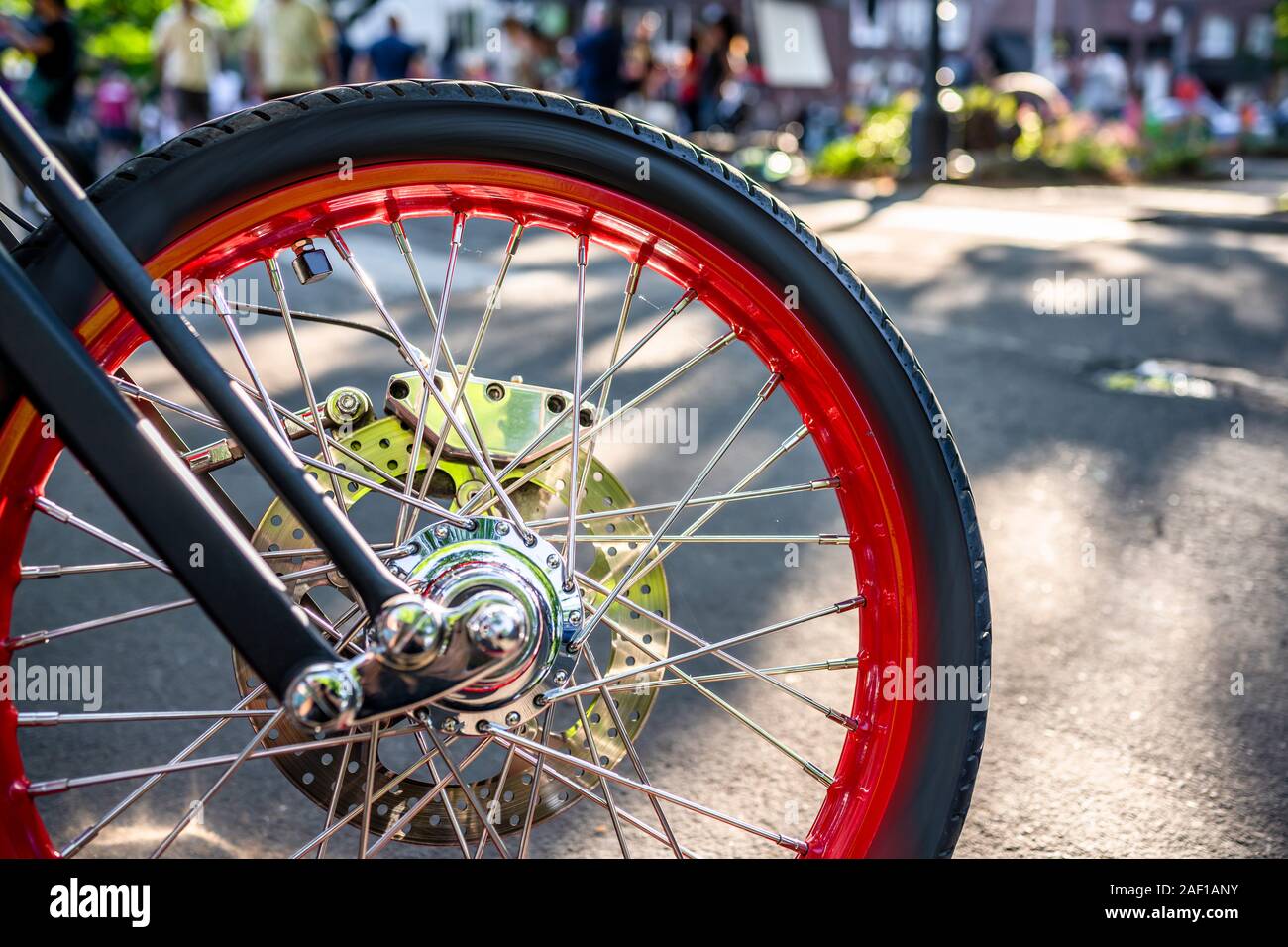Motorcycle wheel of an old vintage retro bike standing at traditional ...