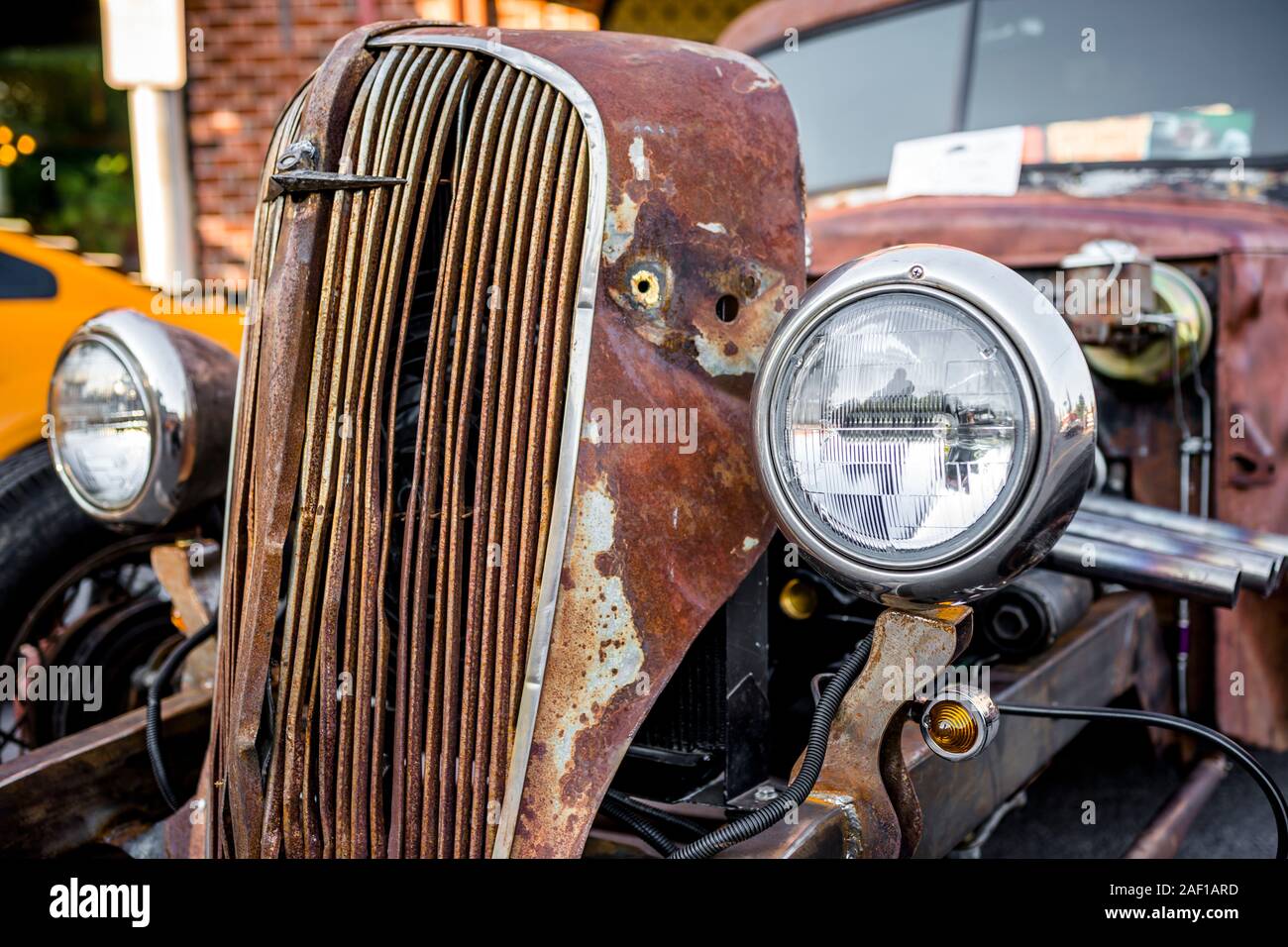 Old rusty vintage retro car half destroyed by time but still continuing ...