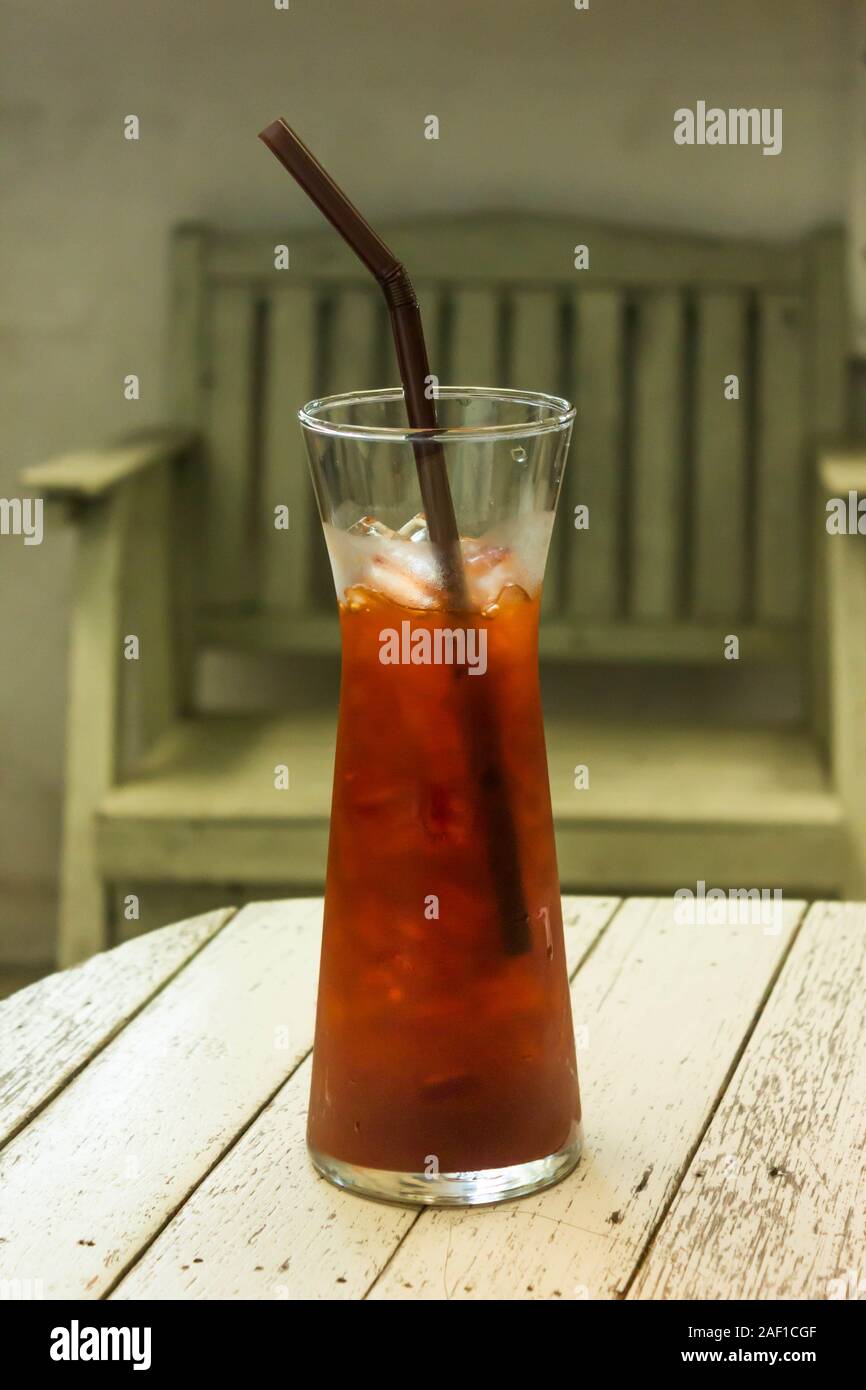 iced tea lemon on wood table background Stock Photo - Alamy