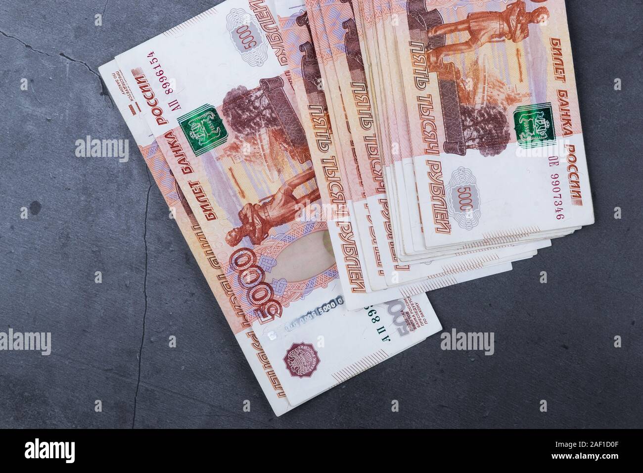 Big stack of Russian money banknotes of five thousand rubles lying on a ...