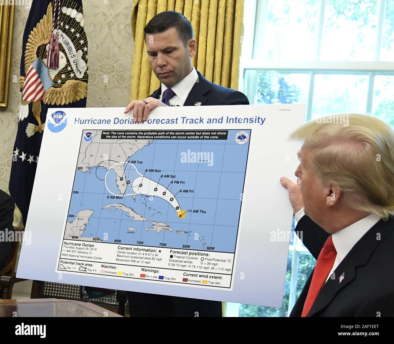 President Donald Trump displays an apparently altered map of the ...