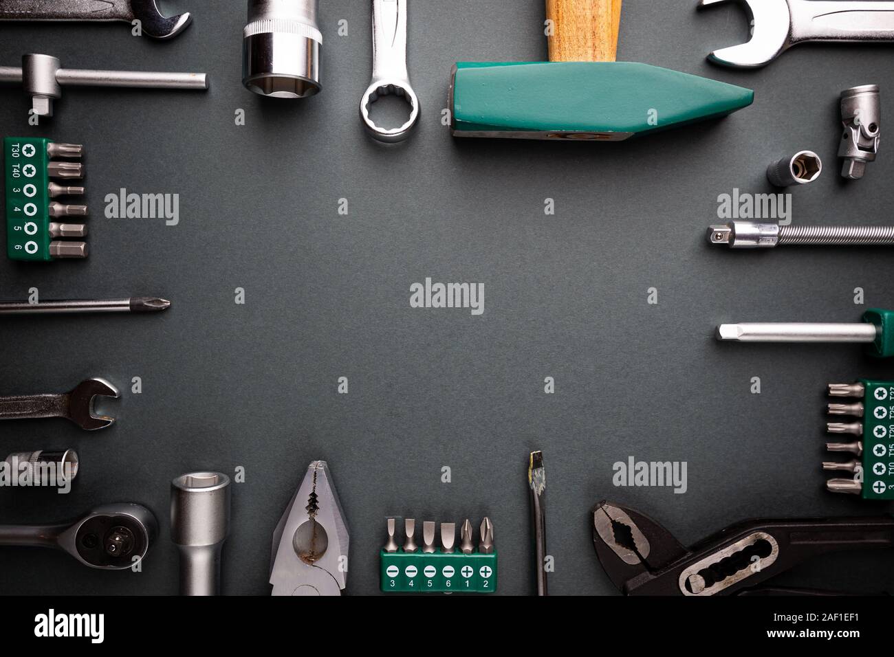 Set of tools over black background, top view with space for text Stock ...