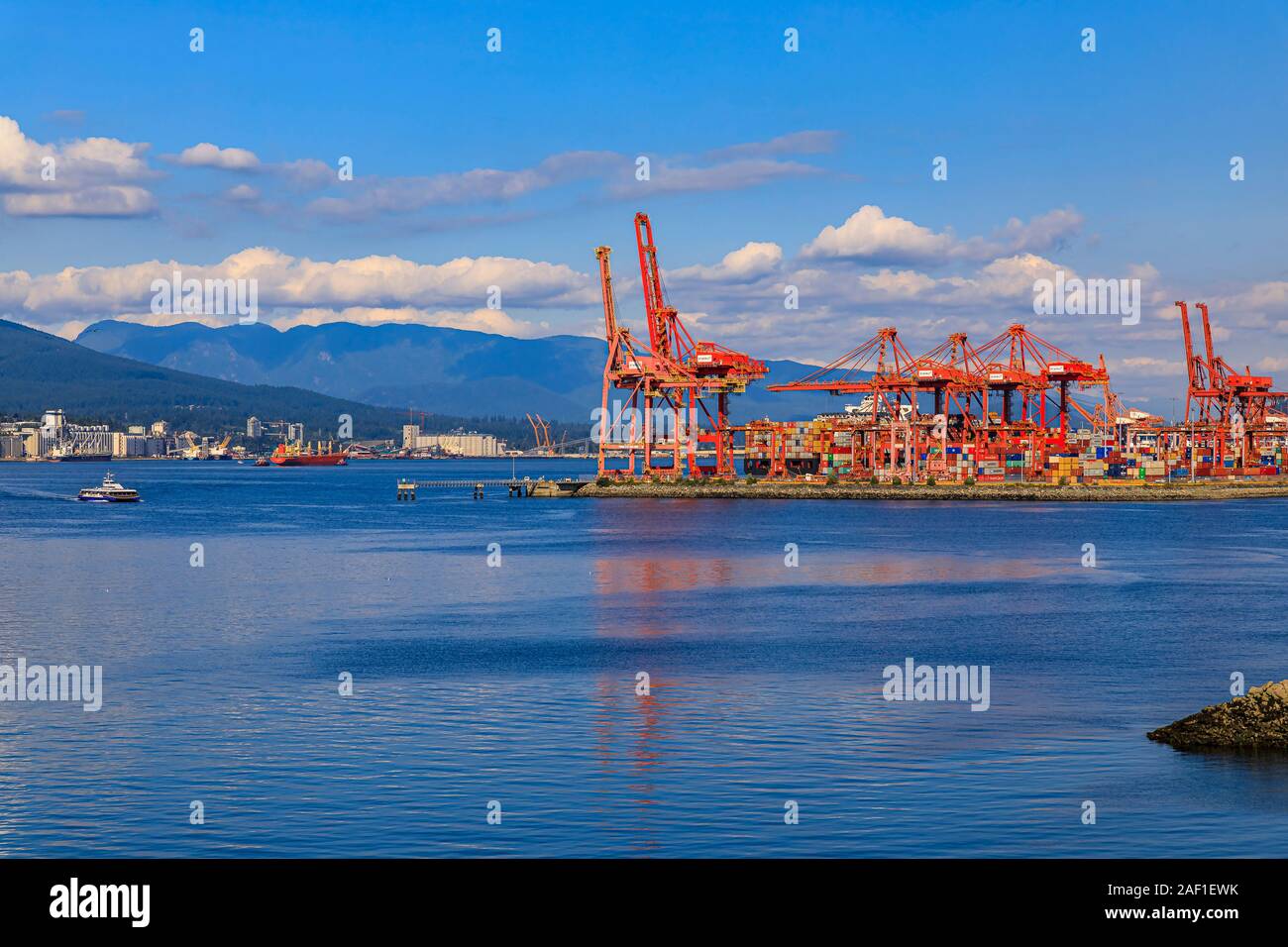 Vancouver, Canada - July 09, 2019: Vancouver's harbour with red gantry ...