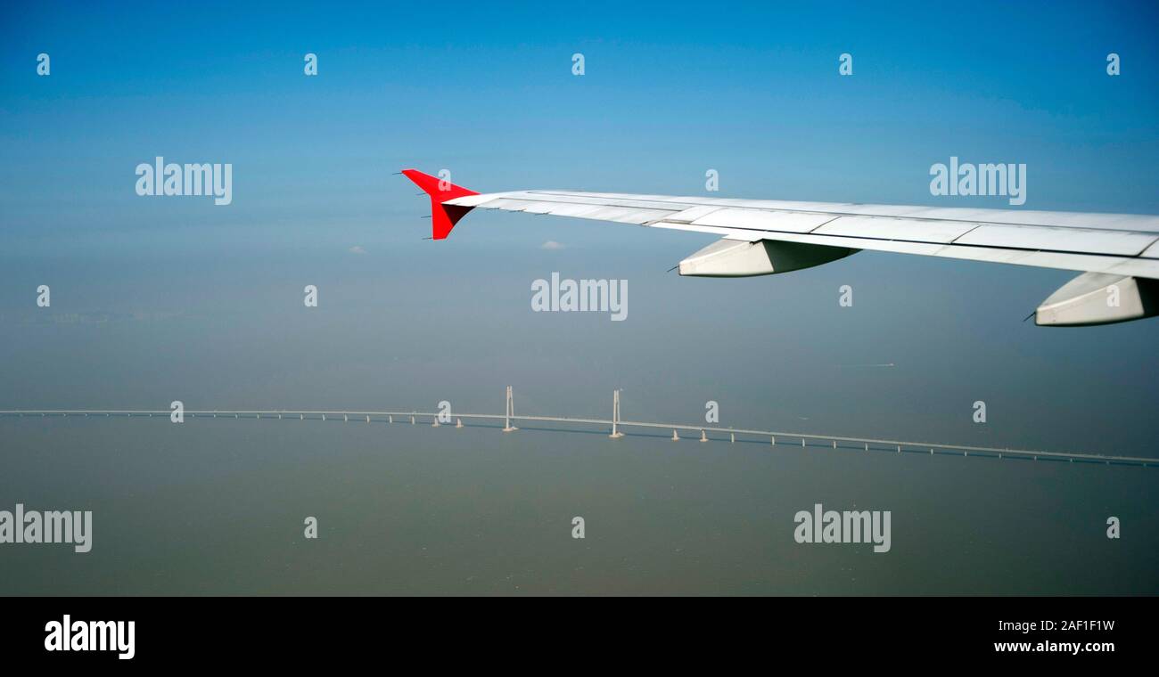 Hong Kong–Zhuhai–Macau Bridge from a plane flying into Hong Kong, China ...