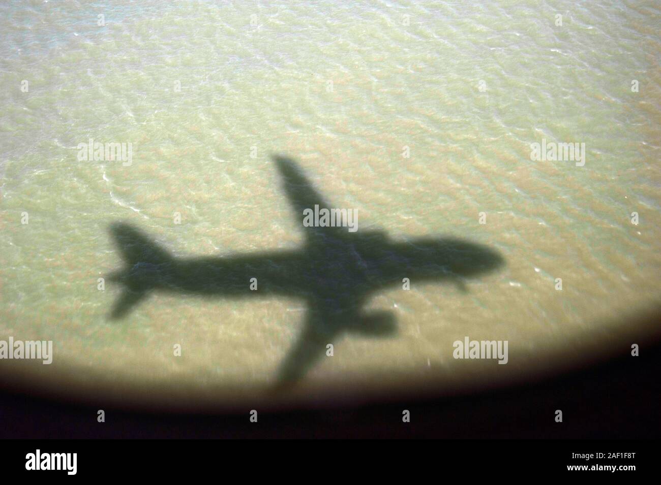 Shadow of aircraft flying into Hong Kong, China, South East Asia Stock ...