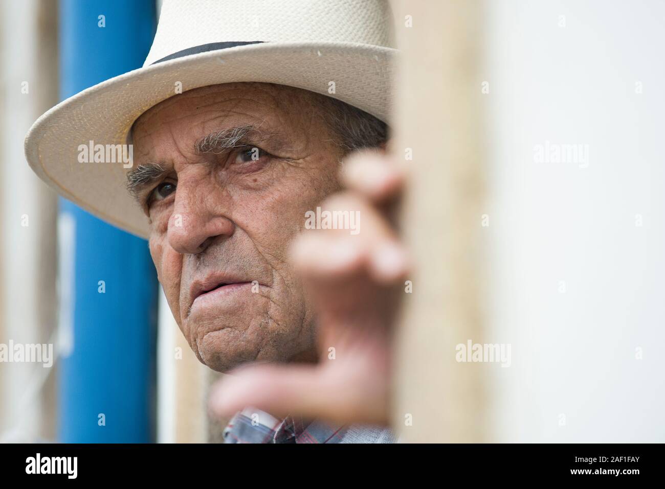 Person observing by the door hi-res stock photography and images - Alamy