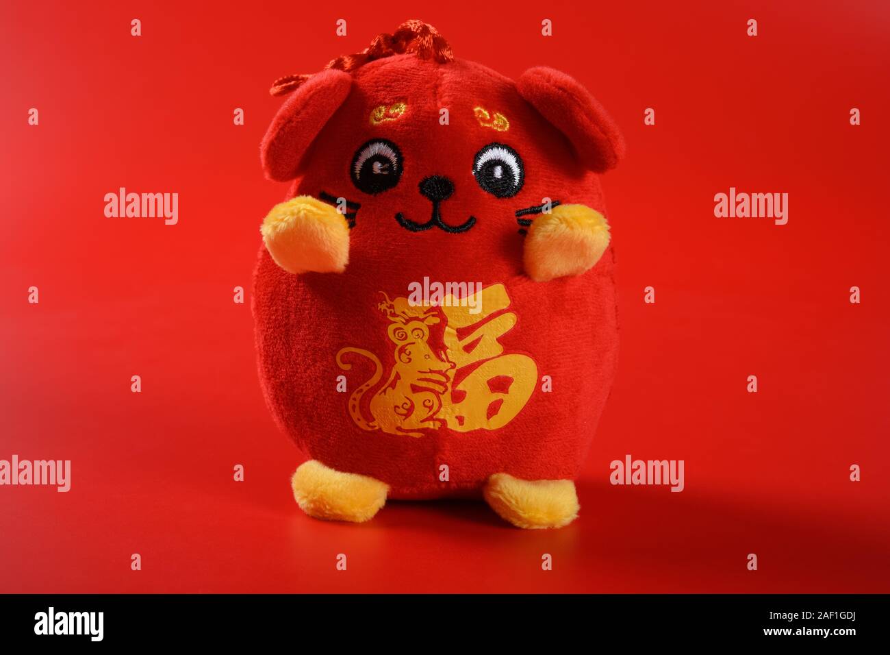 rat mascot on red background the Chinese means fortune Stock Photo - Alamy