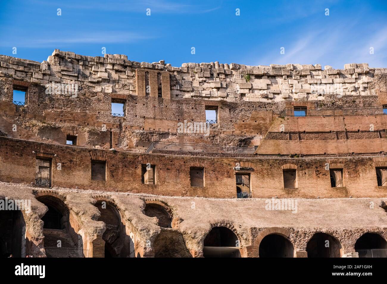 Walls and arches of the Colosseum or Coliseum, an oval amphitheatre in ...