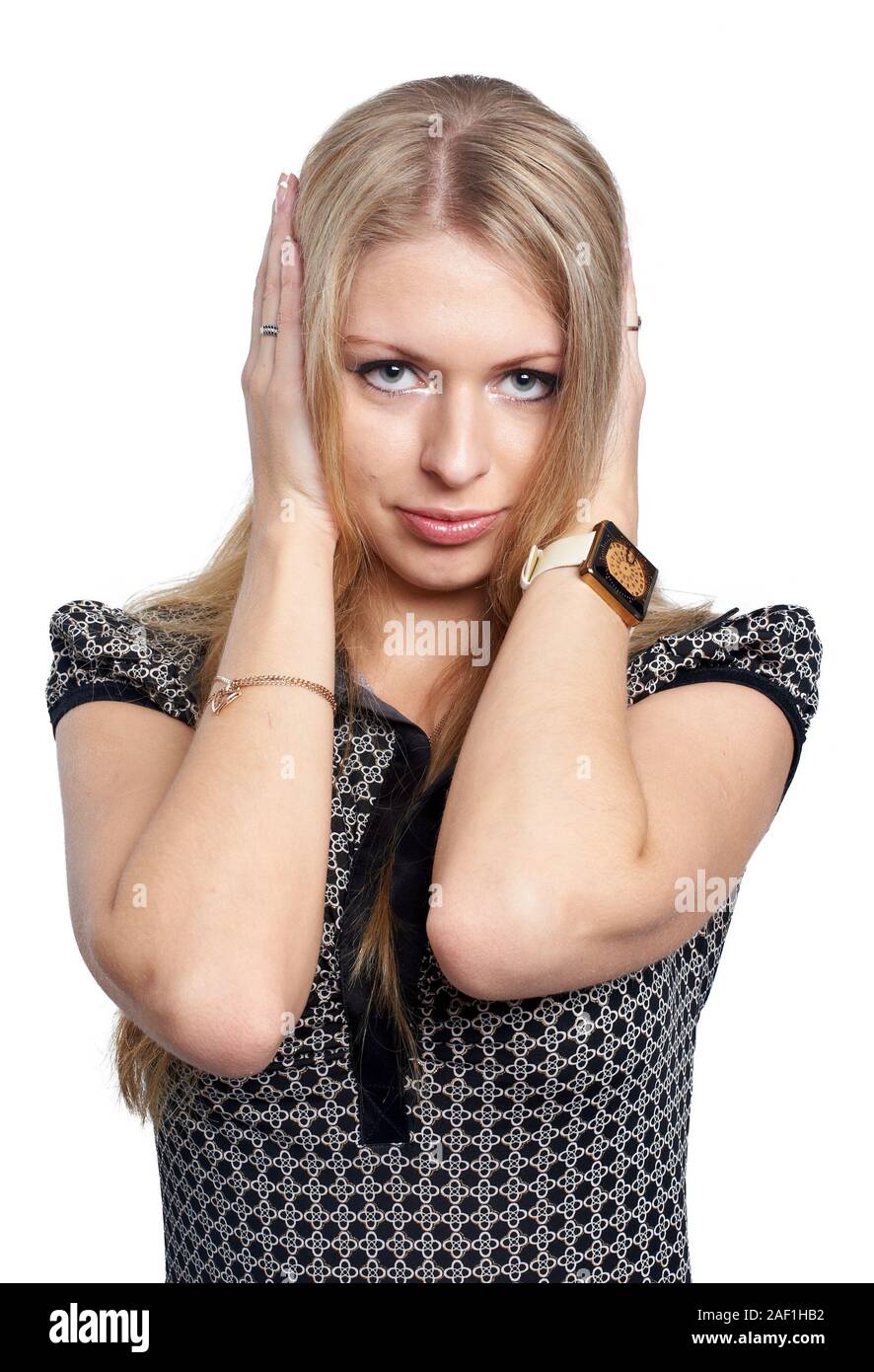 Pretty girl covering er ears Stock Photo - Alamy