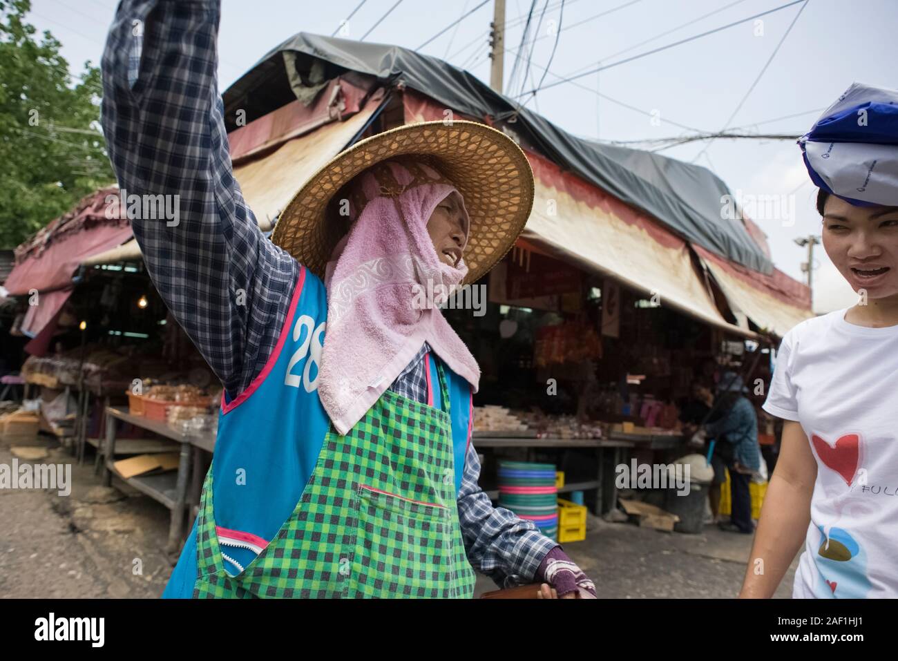 Bangkok, Thailand - April 18, 2011: Mid age Thai woman at work in a ...