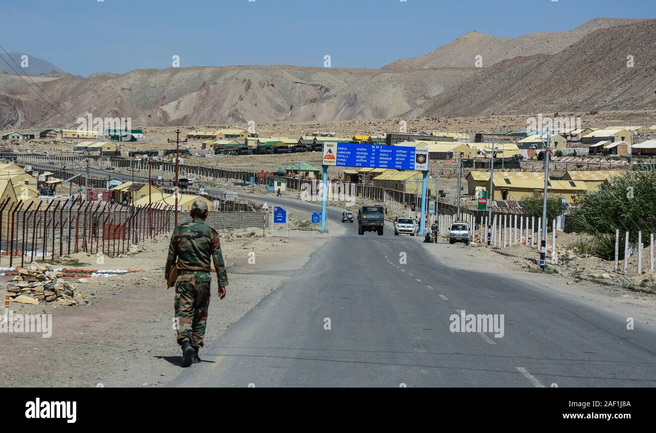 Ladakh, India - Jul 16, 2015. Mountain road with military barrack in ...