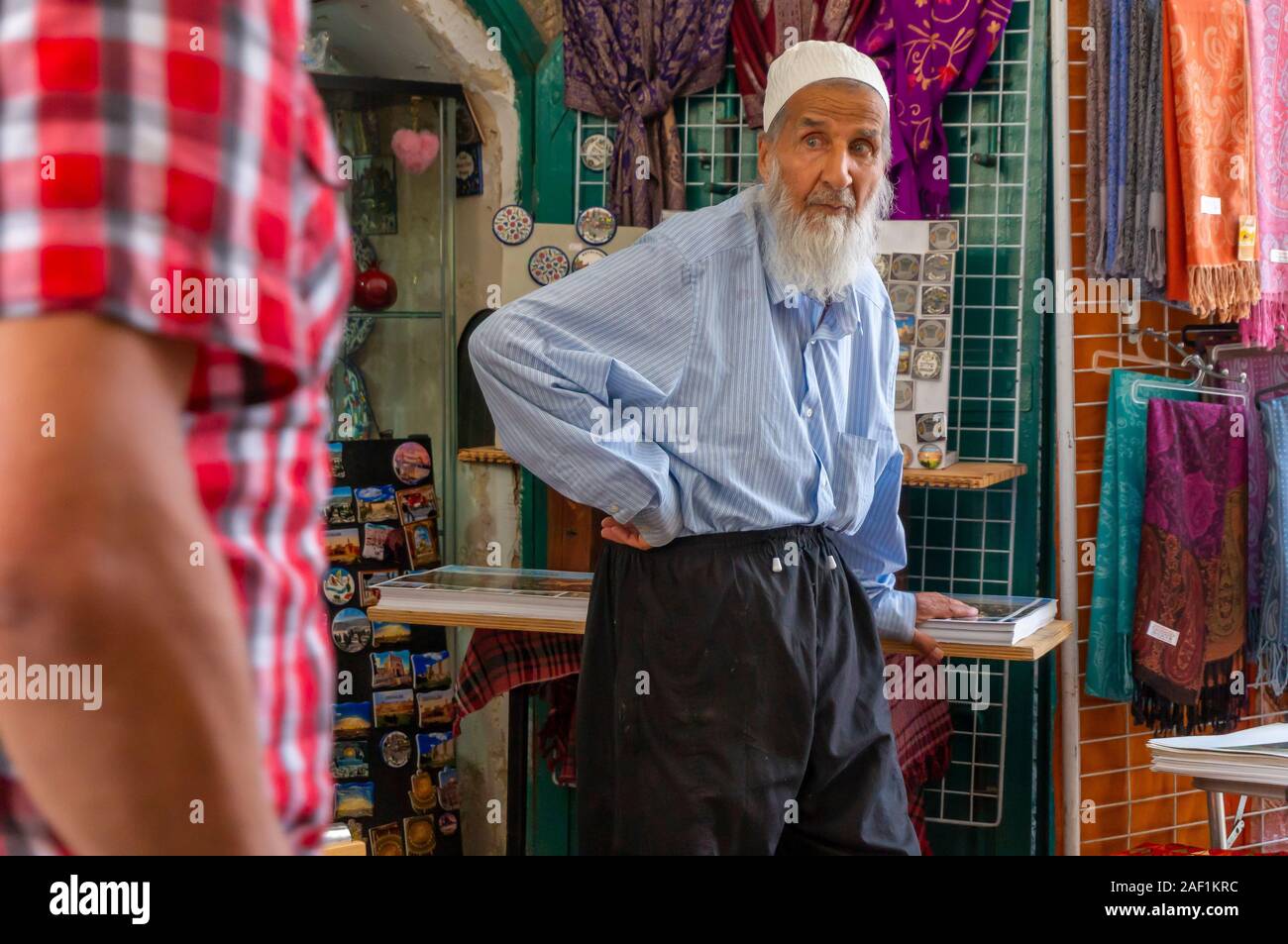 Authentic old Jewish seller in The Old City market situated between the ...