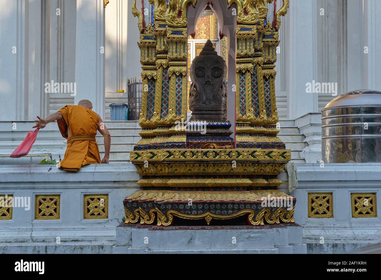 Monks jumps over wall hi-res stock photography and images - Alamy