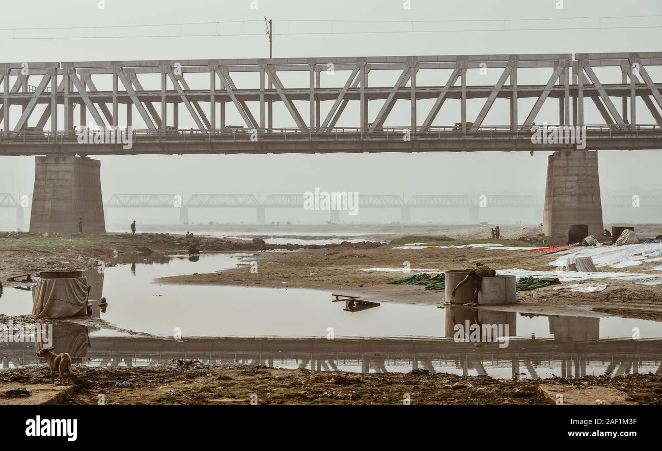 Agra, India - Nov 12, 2017. Steel bridge with Yamuna River at misty day ...
